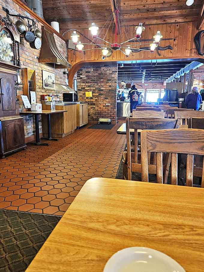 Another angle of the dining room reveals the spacious layout, perfect for accommodating everyone from solo diners to family reunions that got slightly out of hand.