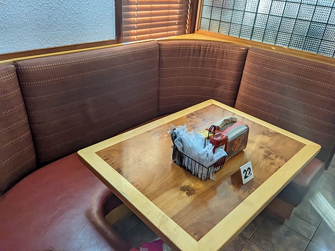 Comfortable booths provide the perfect setting for lingering conversations and strategic planning of your next menu conquest.