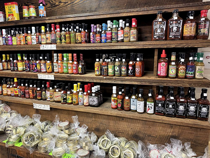 Hot sauce heaven! Wooden shelves groan under the weight of flavor bottles ranging from "pleasantly warm" to "sign this waiver before purchasing."