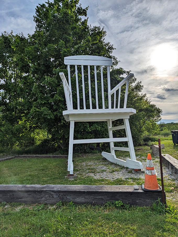 Even against cloudy skies, the chair's bright white presence demands attention &ndash; a beacon of whimsy visible from surprising distances.
