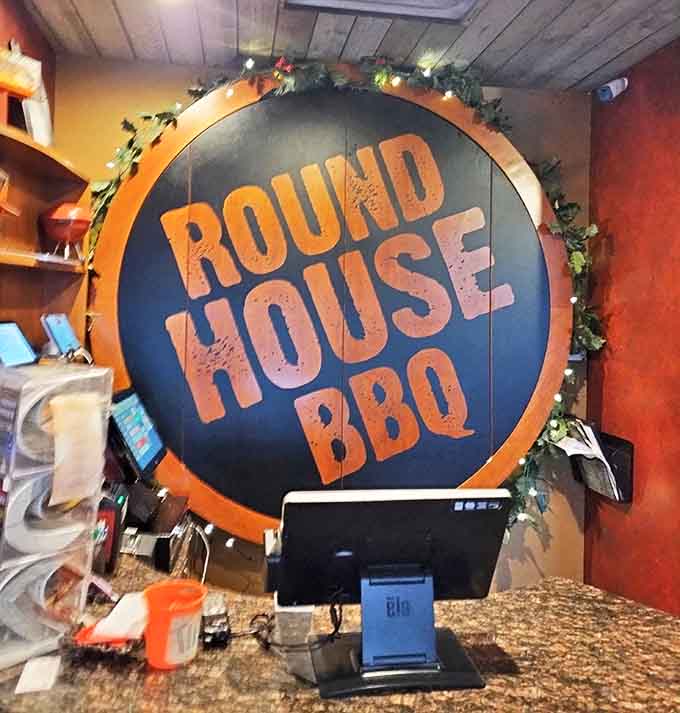 The counter where barbecue dreams come true, backed by the Round House logo that has become synonymous with Michigan's finest smoked meats.