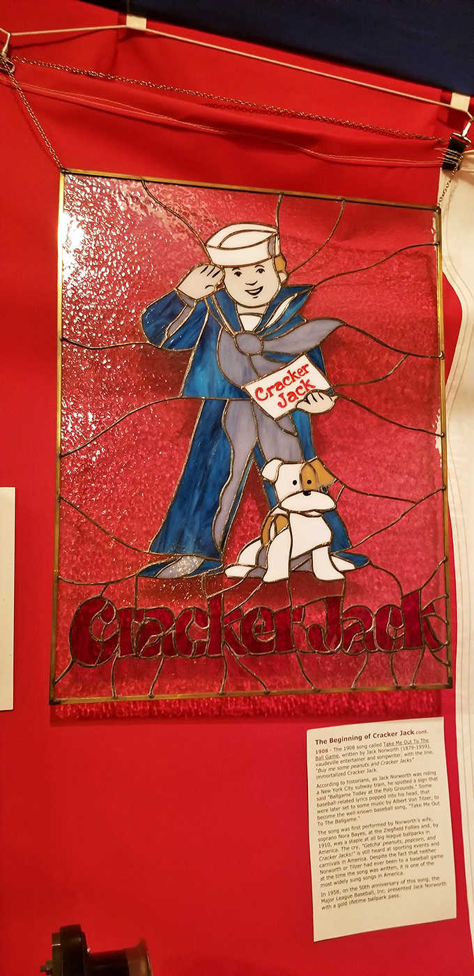 A masterpiece in glass and lead! This Cracker Jack stained glass artwork elevates snack food advertising to fine art, capturing a century of American nostalgia.