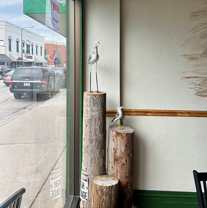 Charming decorative touches like these wooden birds add character to the space without trying too hard.