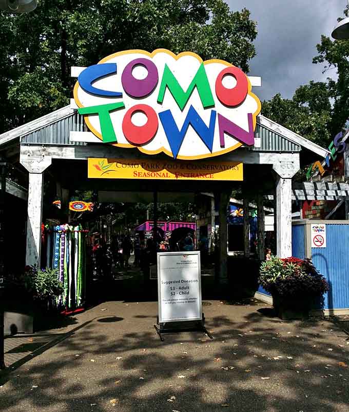 Como Town's vibrant entrance sign promises adventures beyond, standing as a colorful gateway between the ordinary world and a day of extraordinary fun.
