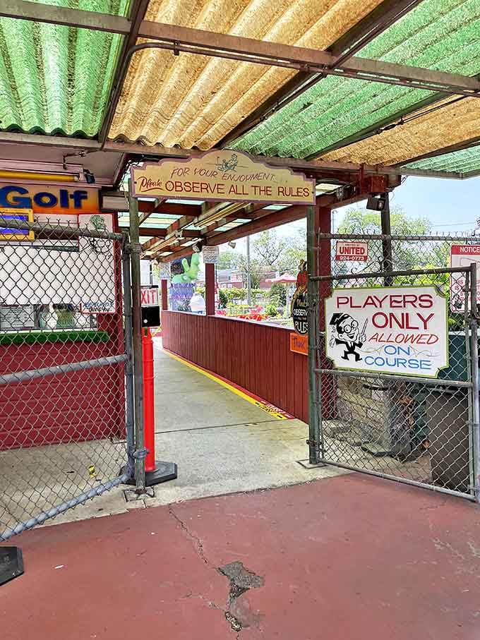 "Players ONLY allowed on course" &ndash; the entrance gate stands as a portal between the ordinary world and this extraordinary realm of mini-golf magic.