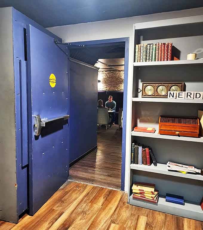 Entryway: That blue door isn't just an entrance &ndash; it's a portal to another era, complete with vintage books and curiosities that set the stage for adventure.