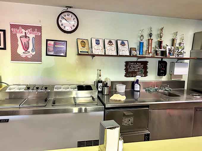 Awards and memorabilia line the walls behind the prep station – silent testimony to decades of delicious consistency.