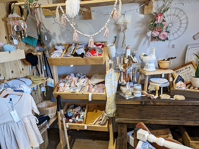 A lovely display of handmade and boutique accessories for children, showcasing cute macrame, stylish headbands, and delightful, unique baby clothes.