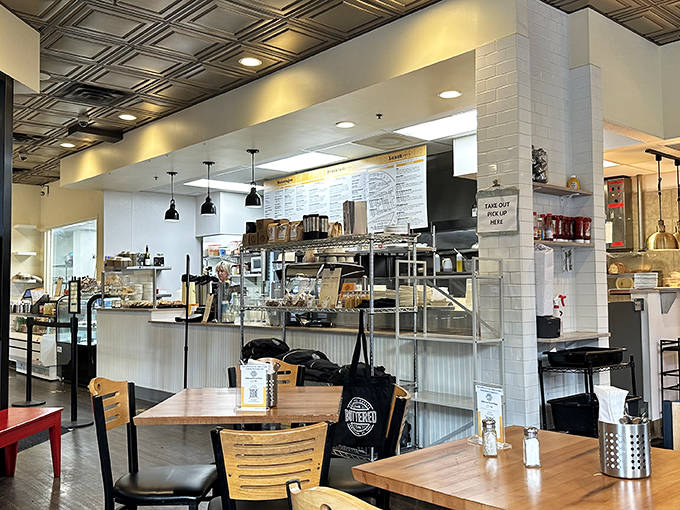 The open kitchen concept lets you witness the choreographed dance of bakers and cooks creating the comfort food that's made this spot legendary.