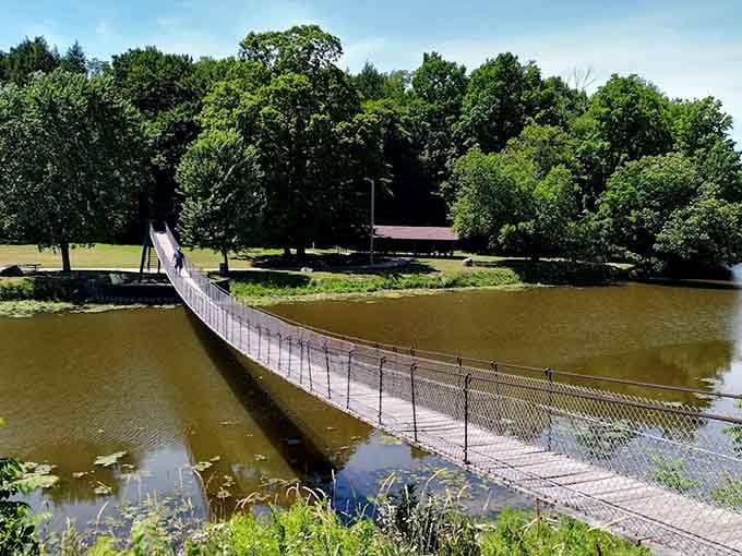 Local fishing competitions bring community together at the river's edge, with the iconic bridge serving as both backdrop and gathering point.