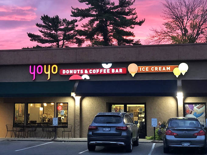 Twilight transforms YoYo Donuts into a beacon of comfort, its warm glow promising sweet refuge from the Minnesota evening.