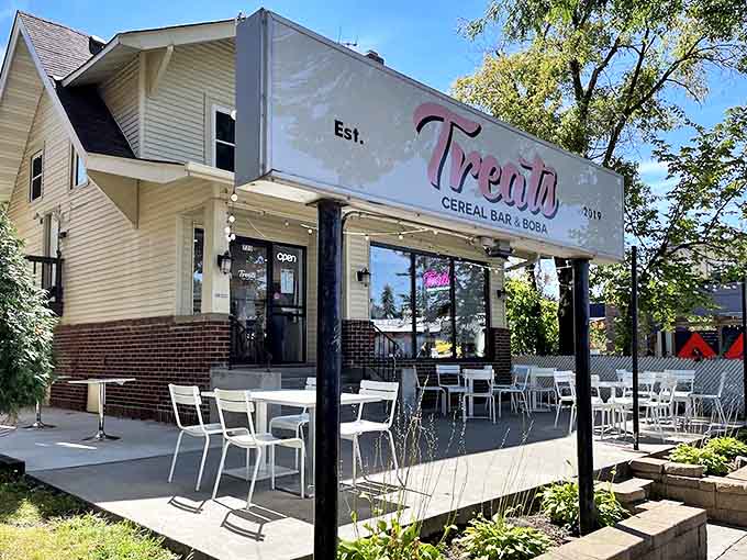 The outdoor seating area offers the perfect spot to enjoy your treats during Minnesota's precious warm months, complete with string lights for evening magic.
