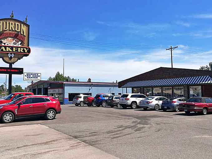 The humble parking lot where great adventures begin, proving that spectacular destinations don't need fancy entrances to deliver unforgettable experiences.