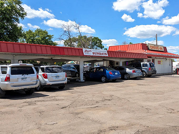 The covered parking section fills with cars during peak hours, a testament to Wagner's enduring popularity across generations of Minnesota diners.