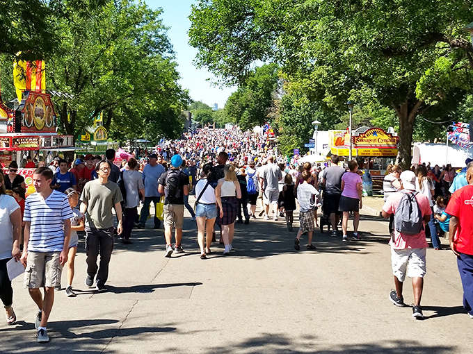 The main thoroughfare buzzes with energy as visitors flow between continents, sampling global treasures without ever needing to show a passport.