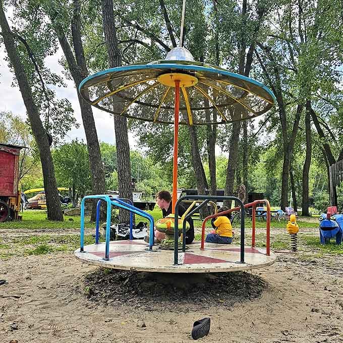 Round and round we go on this cosmic carousel, where playground fun meets outer space design in perfect Minnesota harmony.