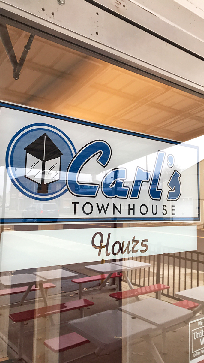 The Carl's Townhouse sign promises more than just a meal &ndash; it's announcing a genuine slice of Americana that's been preserved while the world outside changes.