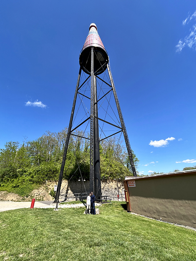 Looking up at greatness! The bottle's impressive height makes visitors feel delightfully small beneath this condiment colossus.