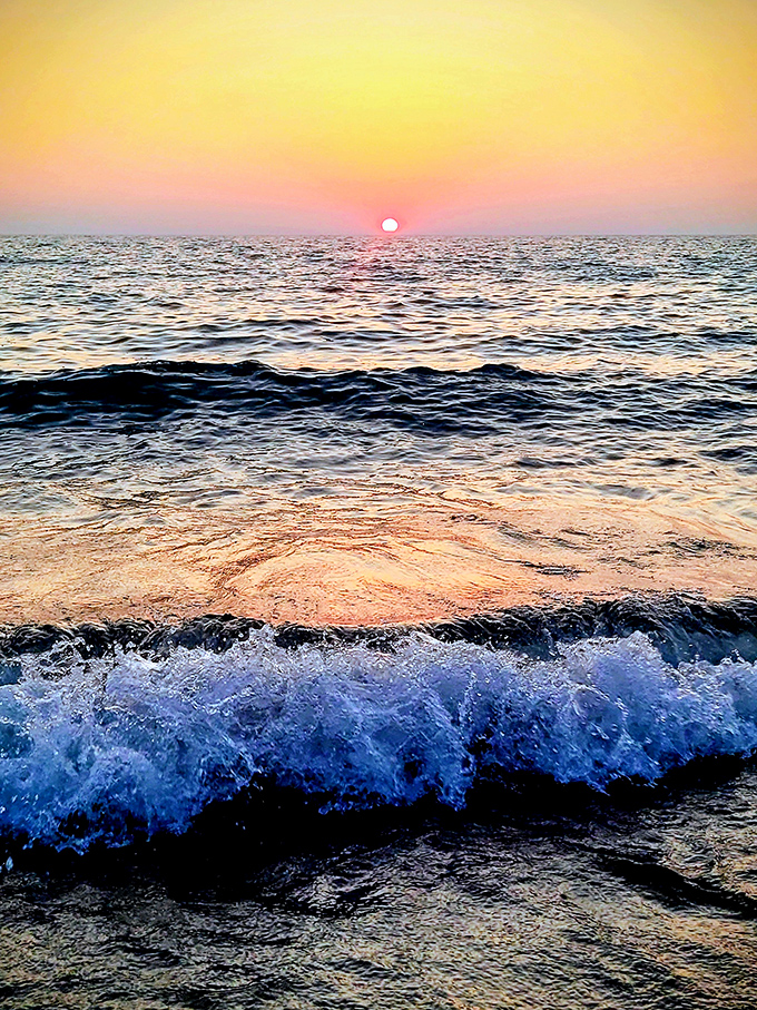 The sun bids a spectacular farewell, painting the horizon in fiery hues that remind us why sunsets are nature's way of saying "See you tomorrow!" Worth the wait every time.