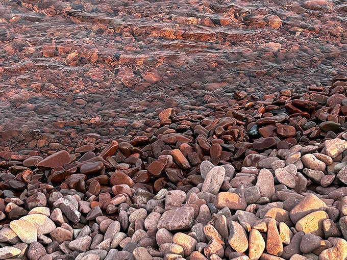 Close-up magic: Lake Superior's tumbling action transforms rough rock into these smooth, jewel-toned pebbles over countless years.