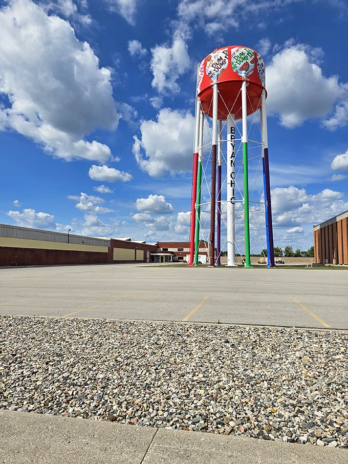 The transformed water tower stands tall against an Ohio sky, its colorful Dum Dums design visible for miles, a beacon for sweet-toothed travelers.