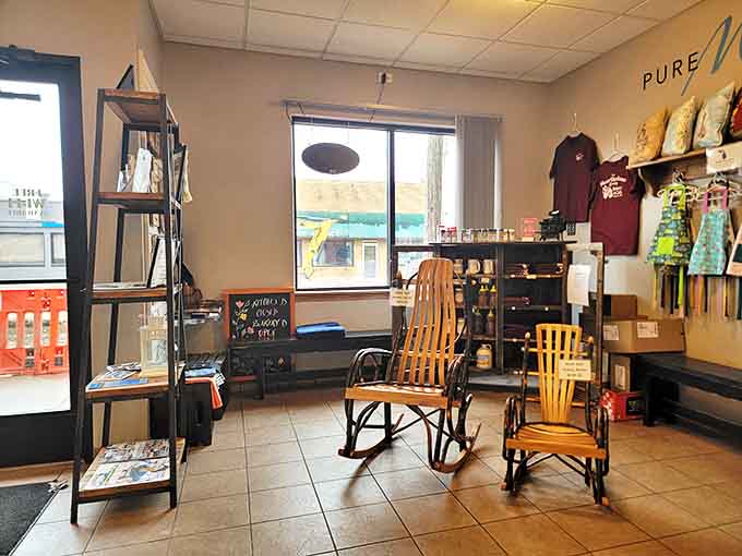 The interior showcases thoughtful touches like wooden rocking chairs and local crafts, creating a space that feels like a well-loved living room.