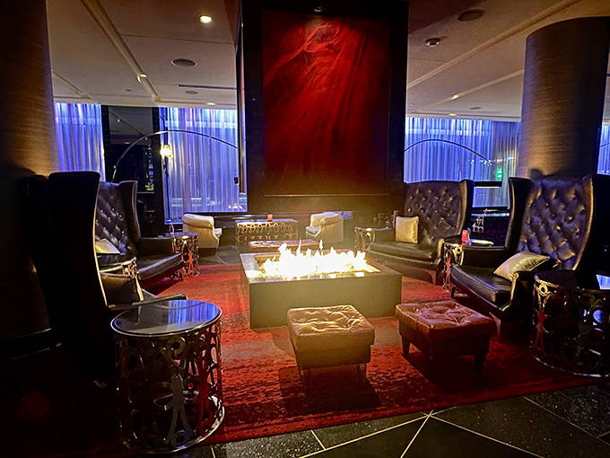 The lounge area &ndash; where leather chairs embrace you and the fireplace creates the perfect ambiance for pre-dinner cocktails.