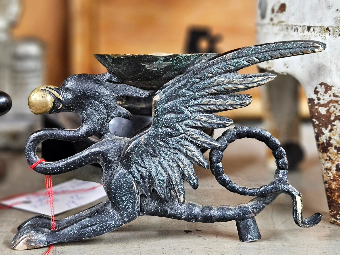 This antique iron dragon isn't just a paperweight &ndash; it's a mythological guardian of desktops, breathing imaginary fire and real personality into any office space.