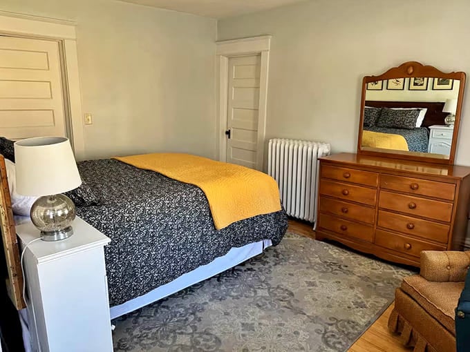 Morning light transforms this bedroom into a golden retreat – hitting snooze has never felt so luxuriously justified.