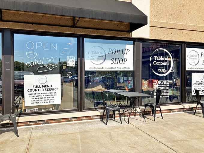These simple metal chairs create a perfect perch for enjoying both Michigan sunshine and a newly purchased paperback, proving good reads taste better with fresh air.