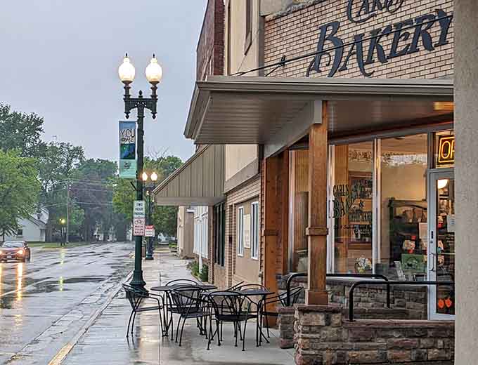 Carl's Bakery standing proud on Main Street, looking exactly like the kind of place that's been making people happy since Eisenhower was president.