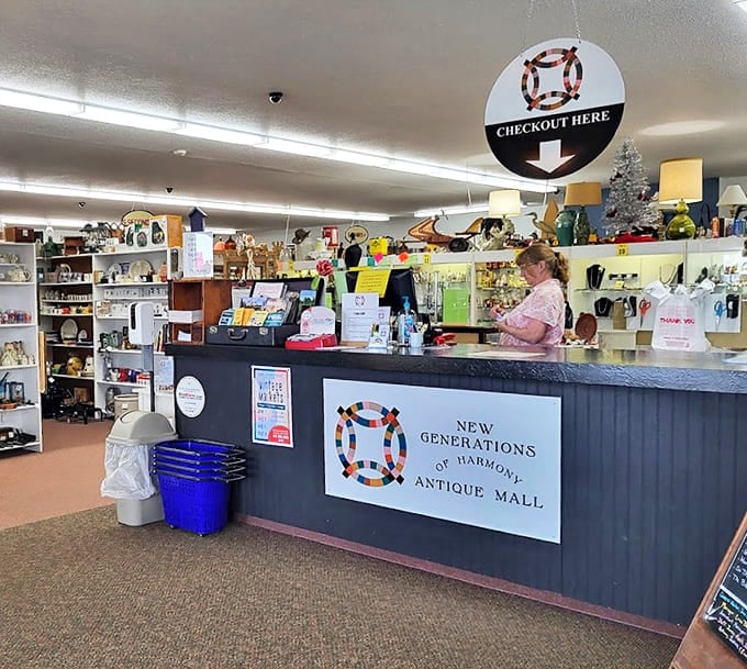 The friendly checkout counter where treasures and stories converge, staffed by folks who understand the difference between junk and heritage.
