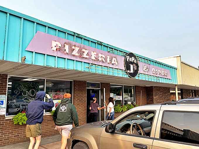 The classic exterior draws in curious travelers and loyal locals alike, promising a journey back to simpler times and fuller bellies.