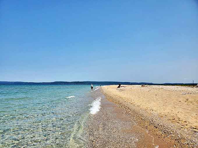 Crystal clear waters invite tired hikers for a refreshing dip &ndash; nature's perfect reward after conquering the dunes.