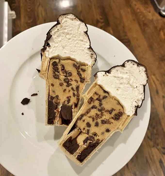 These marshmallow squares aren't just treats – they're architectural marvels of flavor, stacked in perfect orange and chocolate harmony.