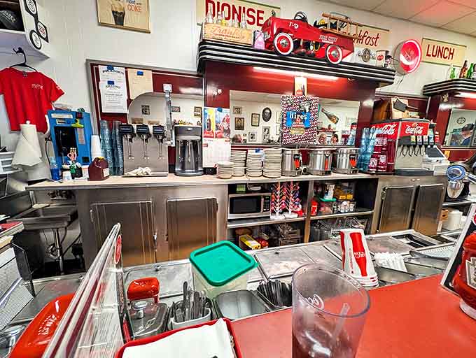Behind this counter, burger magic happens daily &ndash; the well-seasoned grill has been the silent witness to decades of culinary perfection.