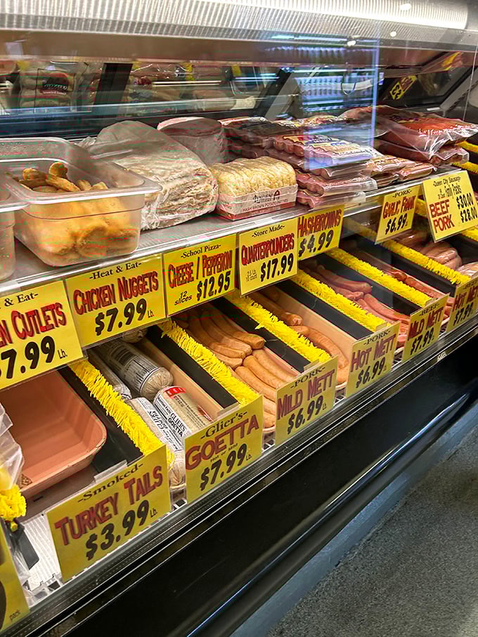 The deli counter showcases Cincinnati's multicultural heritage, where traditional German wursts share space with Italian salumi and local specialties.