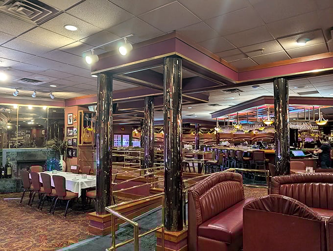 The dining room's elegant columns and warm lighting create an atmosphere that modern restaurants try desperately to replicate.