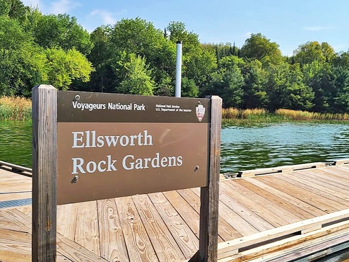 The official park service sign welcomes boaters to this accessible-only-by-water destination, where Minnesota's wilderness and human creativity have formed a perfect partnership.