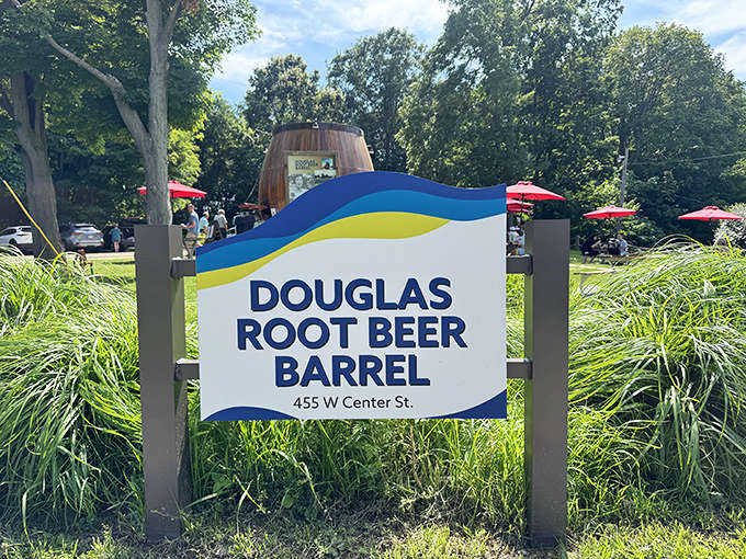 The sign says it all &ndash; Douglas Root Beer Barrel, where a simple roadside stop becomes the highlight of your Michigan adventure.