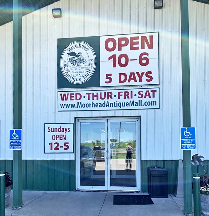 The full exterior view reveals both the mini-golf entrance and the mysterious silver spacecraft &ndash; your first hint that this isn't ordinary entertainment.