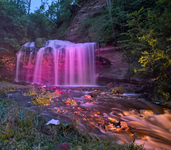 Sunset paints Cascade Falls in magical pink hues, transforming ordinary water into a dreamscape that seems almost too beautiful to be real.