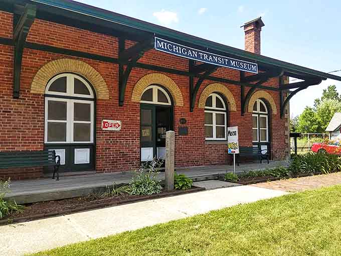 The Michigan Transit Museum's home base welcomes visitors with classic brick architecture and the promise of railway adventures just beyond those doors.