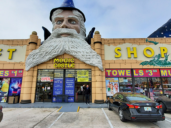 The wizard's castle beckons from the parking lot, promising air conditioning, bathroom access, and souvenirs you never knew you needed until now.