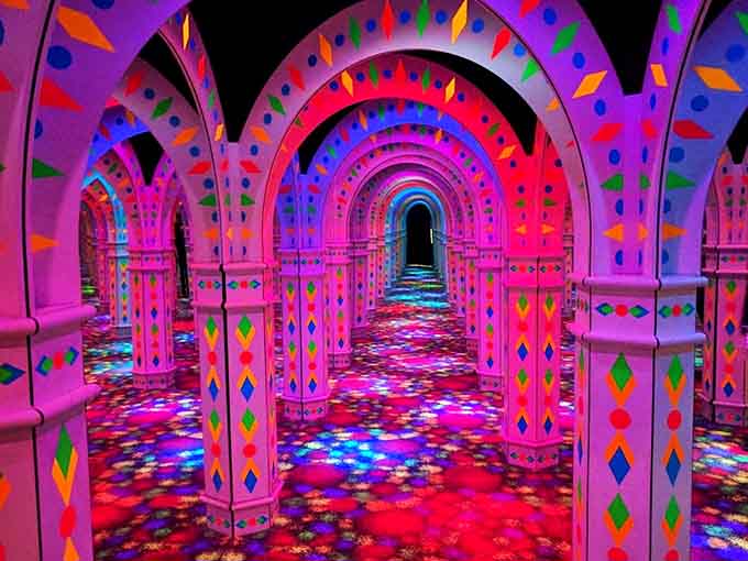 The hallway stretches into infinity, a tunnel of light and color that challenges perception and rewards the adventurous spirit.