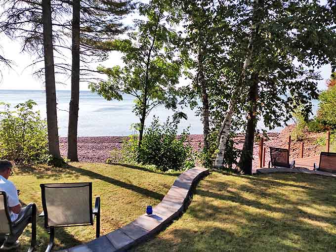 This peaceful lakeside perch offers front-row seats to nature's greatest show, where doing absolutely nothing becomes the day's most rewarding activity.