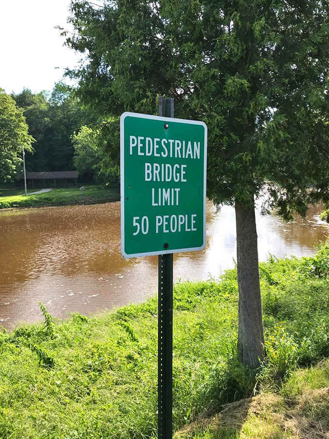 Safety signage reminds visitors of common-sense precautions, balancing adventure with responsible enjoyment of this historic structure.