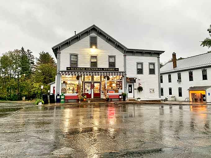 Even on rainy days, the warm glow from within transforms the historic building into a lighthouse of community and comfort.