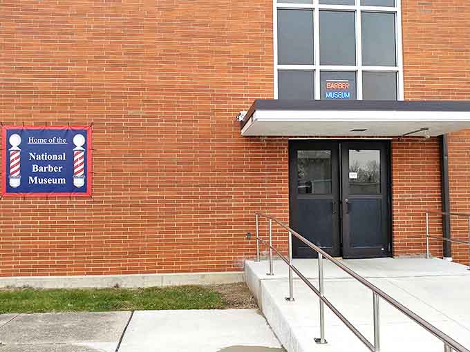 The museum entrance beckons curious visitors with its iconic barber pole sign &ndash; a swirling invitation to explore hair history.