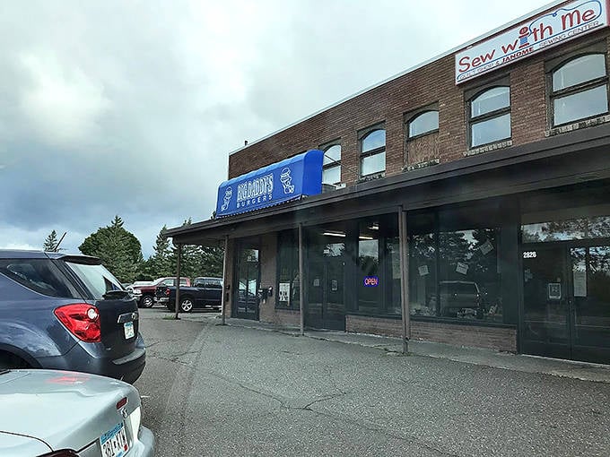 The Mudd Room's exterior view &ndash; brick, stone, and subtle signage that whispers rather than shouts about the treasures within.